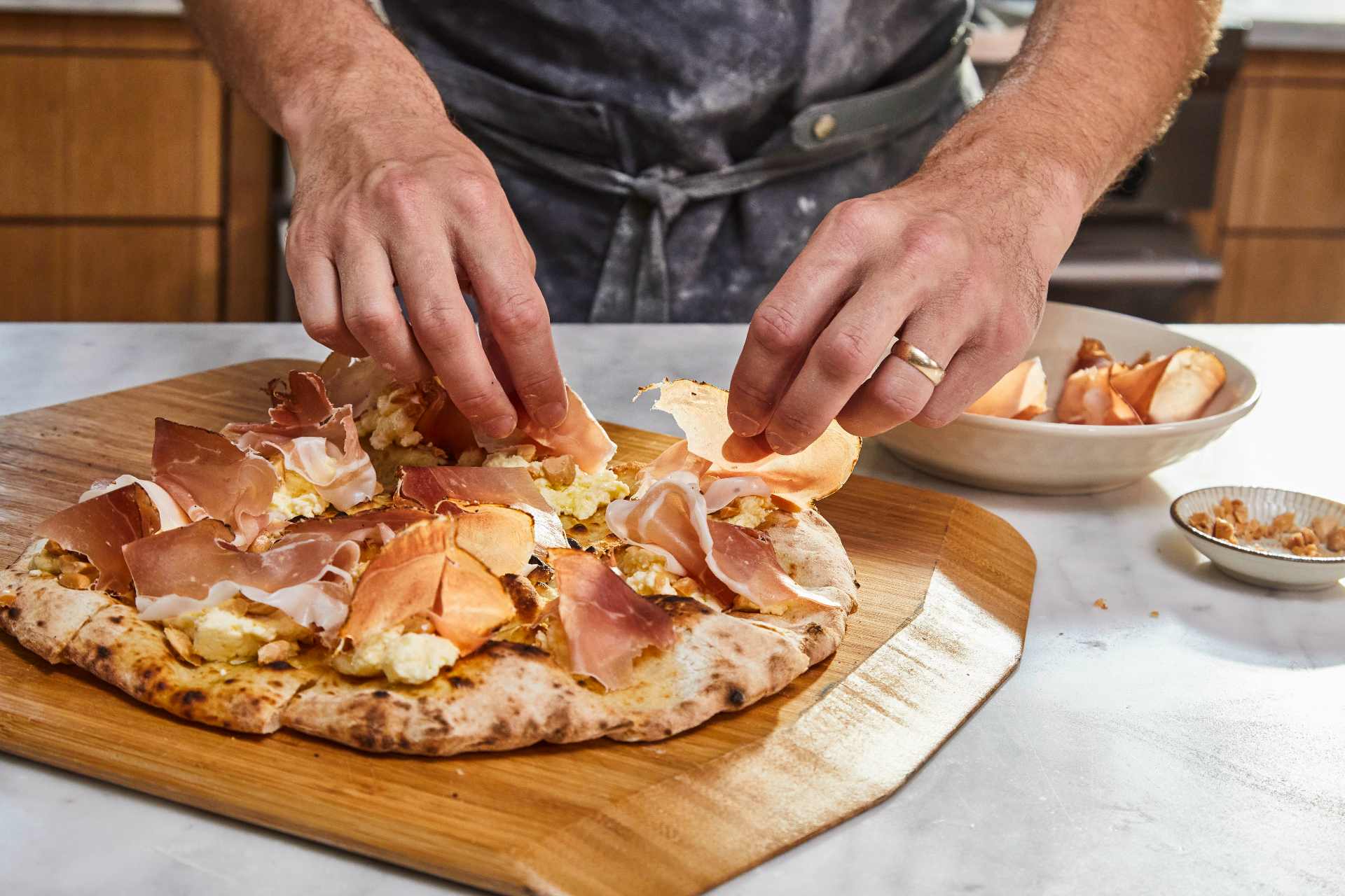 Pizza Crostini with Ricotta, Speck and Marcona Almonds — Ooni USA